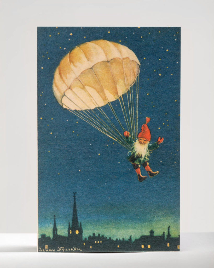 Julkort med tomte i fallskärm- Vykort - Postmuseum